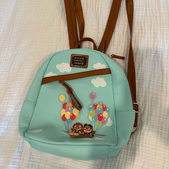 Loungefly | Bags | Loungefly Blue And Brown Backpack With Character ...